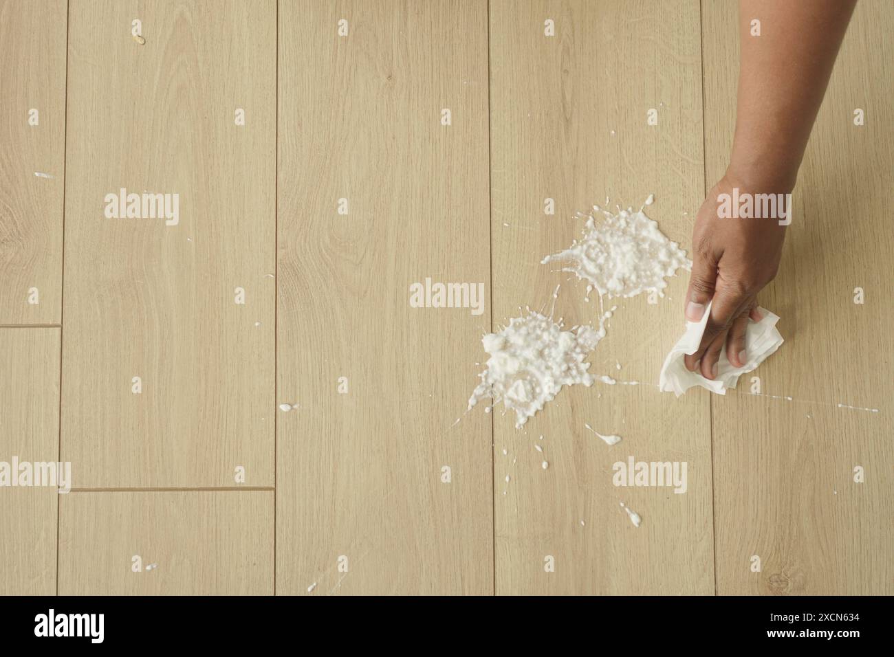 A man's hand washing the floor with a cloth Stock Photo - Alamy