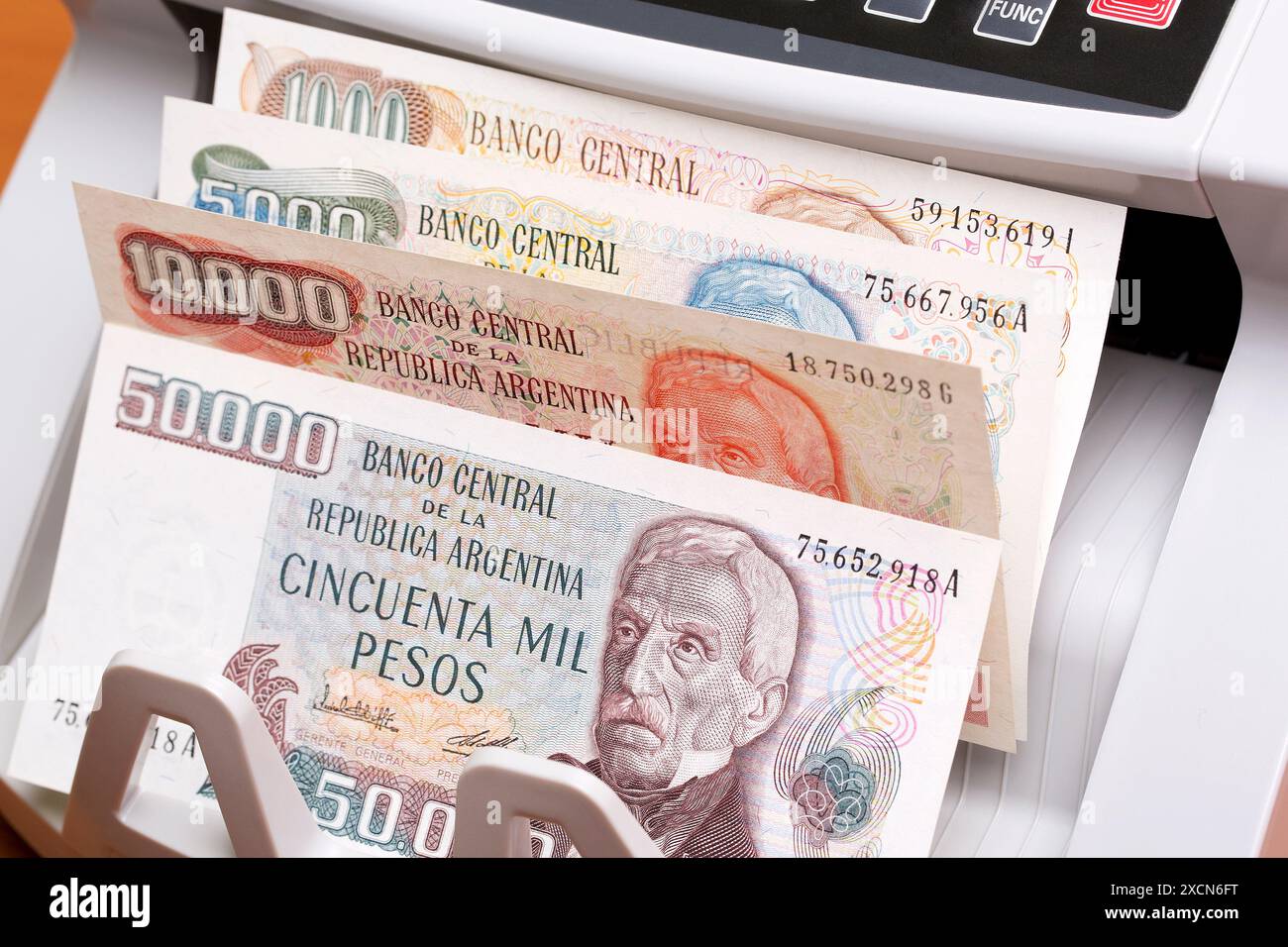 Argentine money - peso in the counting machine Stock Photo - Alamy