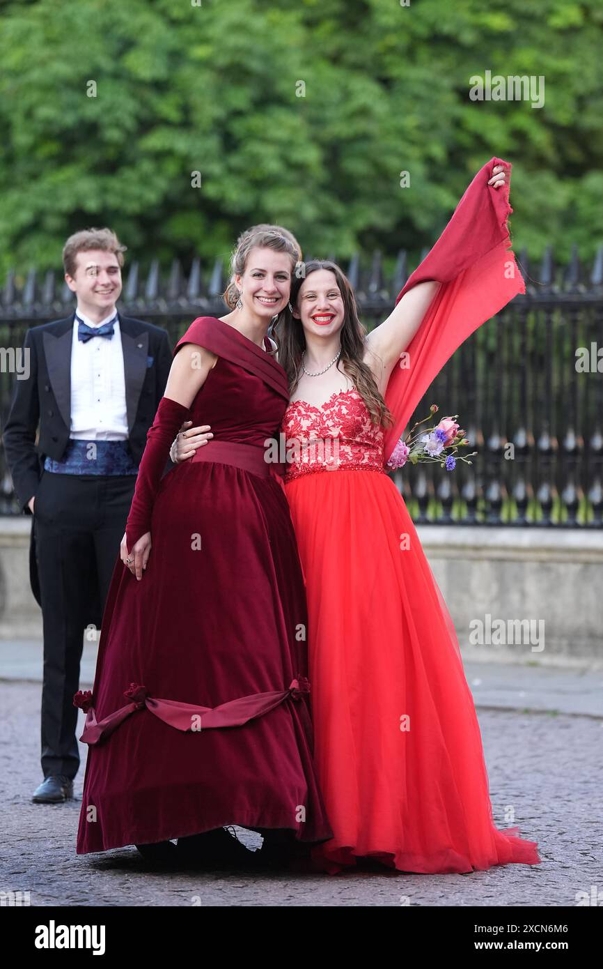 Students from Cambridge University make their way home after ...