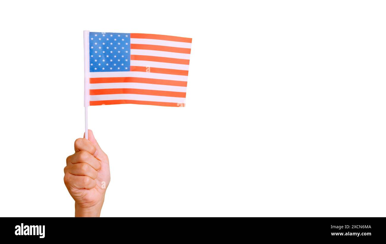 Wind waving a United States pennant holding by a hand Stock Photo - Alamy