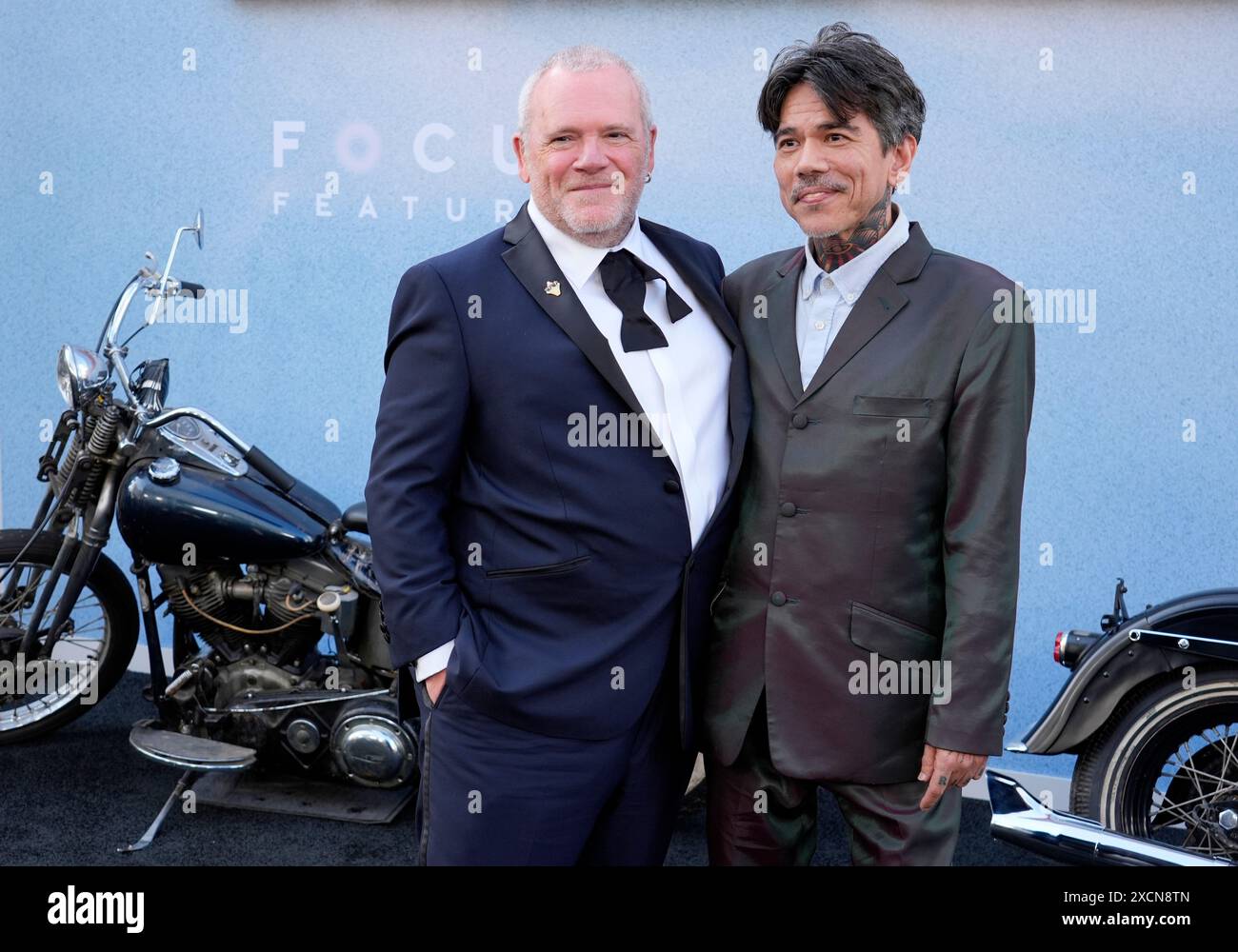 Hugo Burnham, left, and David Pajo pose together at the premiere of the ...