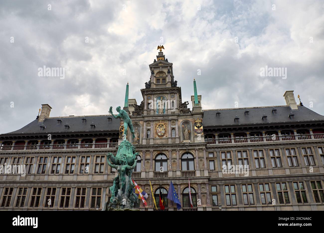 Green bronze Brabo statue on Grote Markt. Detail about throwing the ...