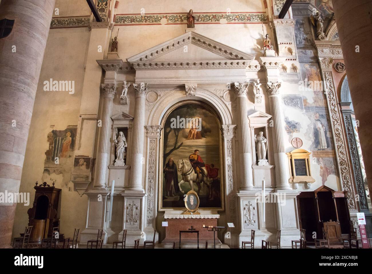 St. Martin in the act of giving his cloak to the poor, with the Virgin ...