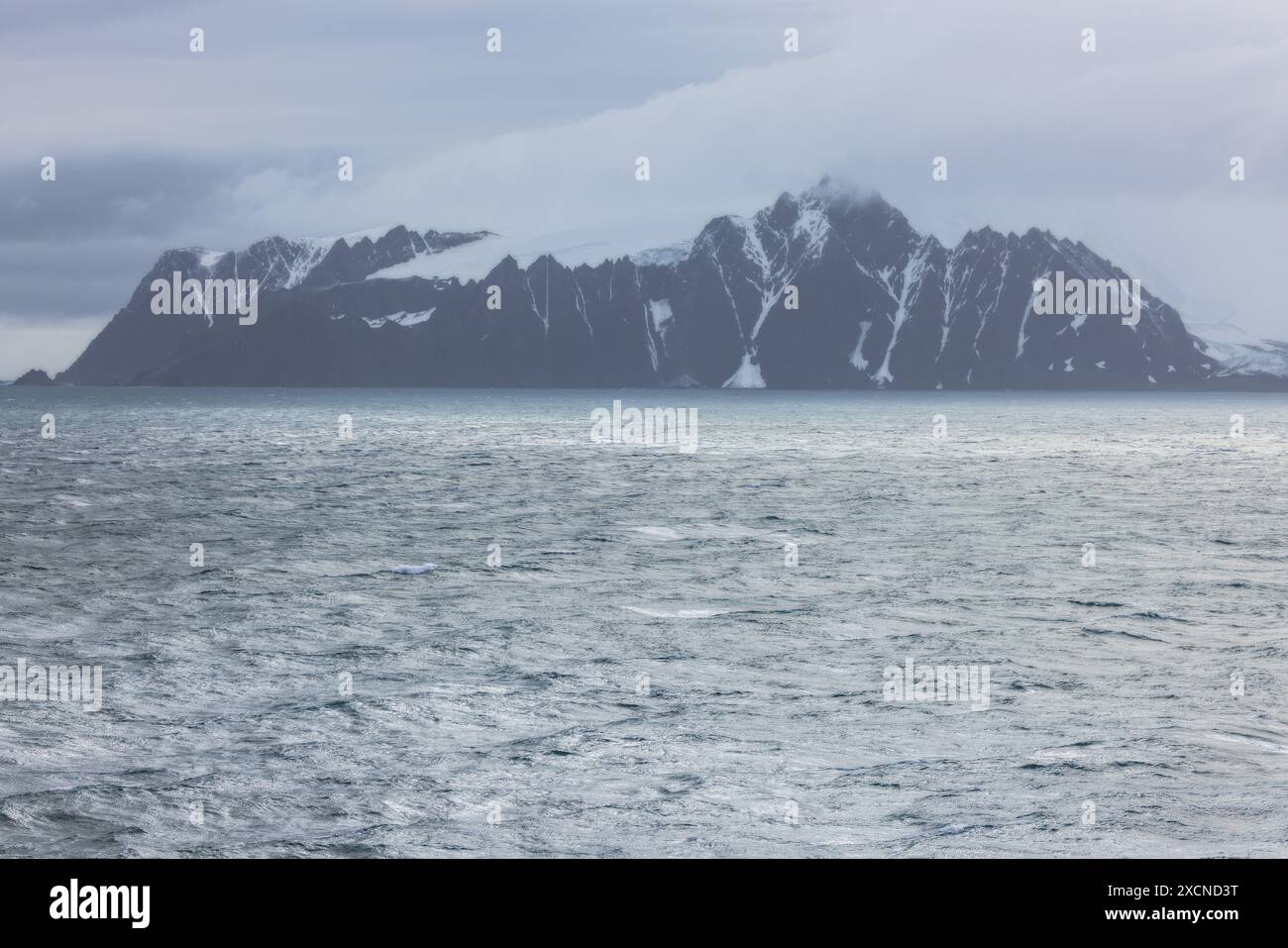 Elephant Island rising from the Antarctic Ocean a mountainous island ...