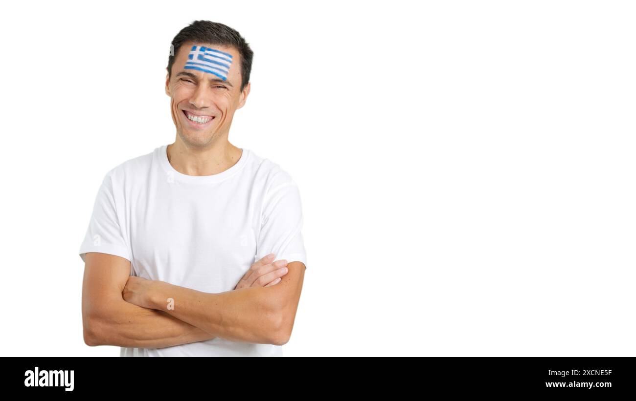 Man standing with greek flag painted on face smiling Stock Photo - Alamy
