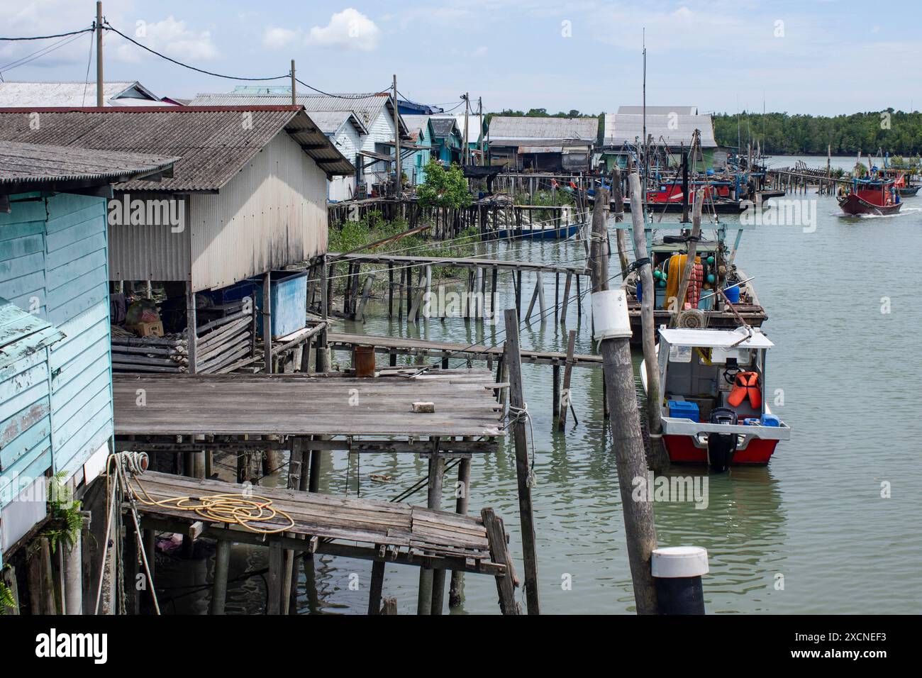 Fishing boats stilt houses town hi-res stock photography and images - Alamy