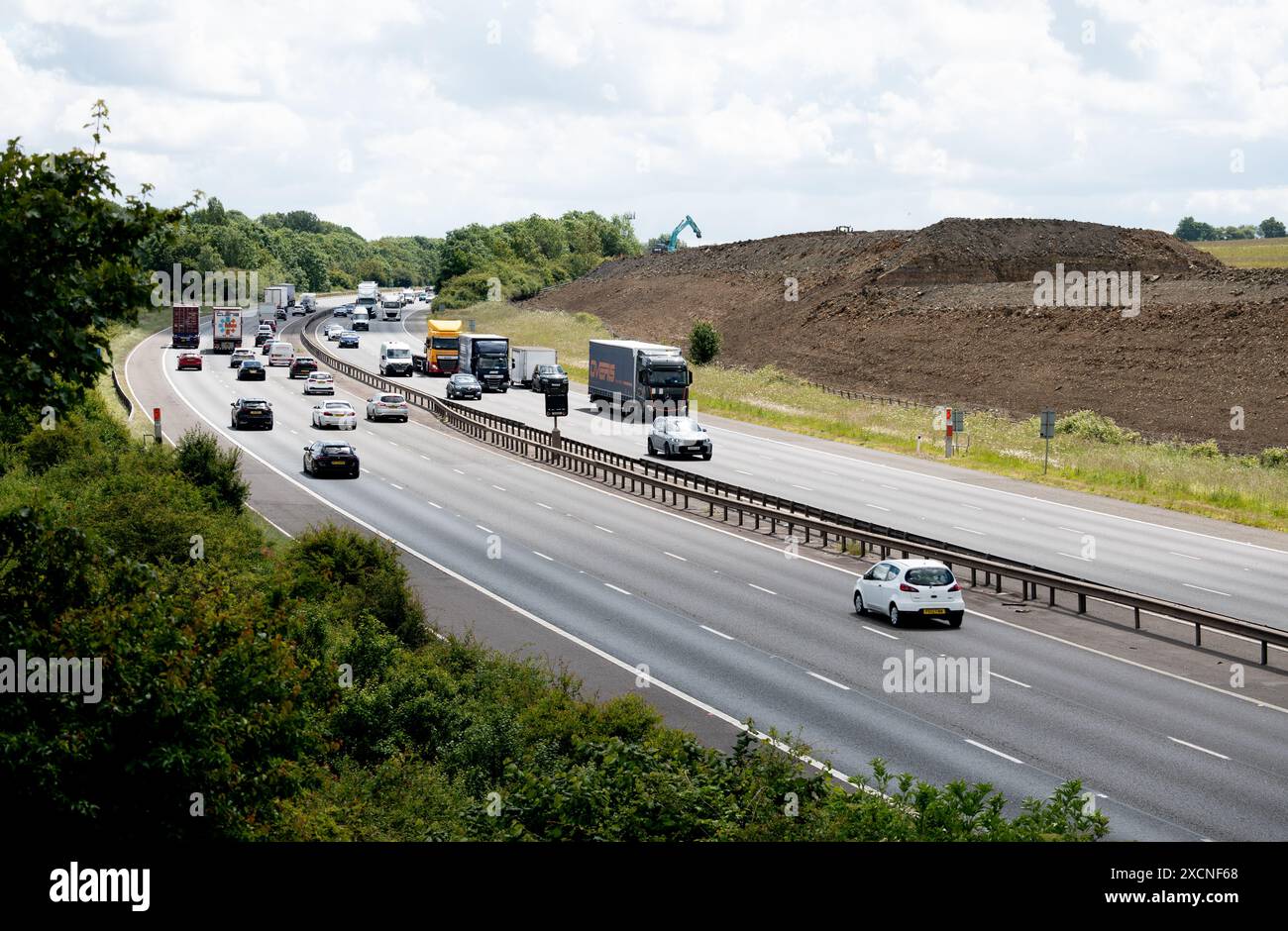 Bund construction for the Bamford Park housing estate alongside the M40 ...