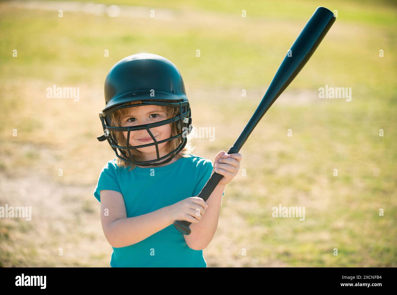 Little boy posing with a baseball bat. Portrait of kid playing baseball ...