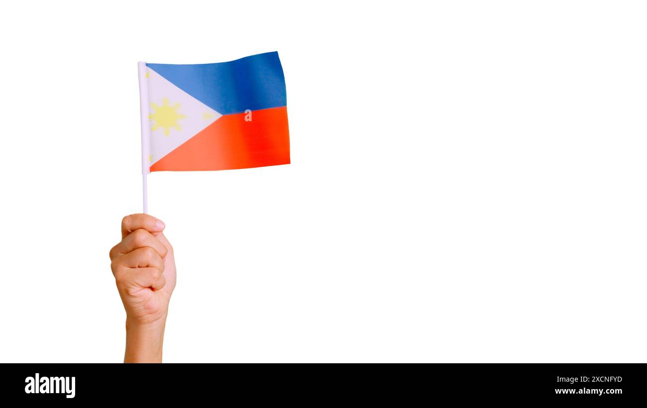 Wind waving a philippine pennant holding by a hand Stock Photo - Alamy