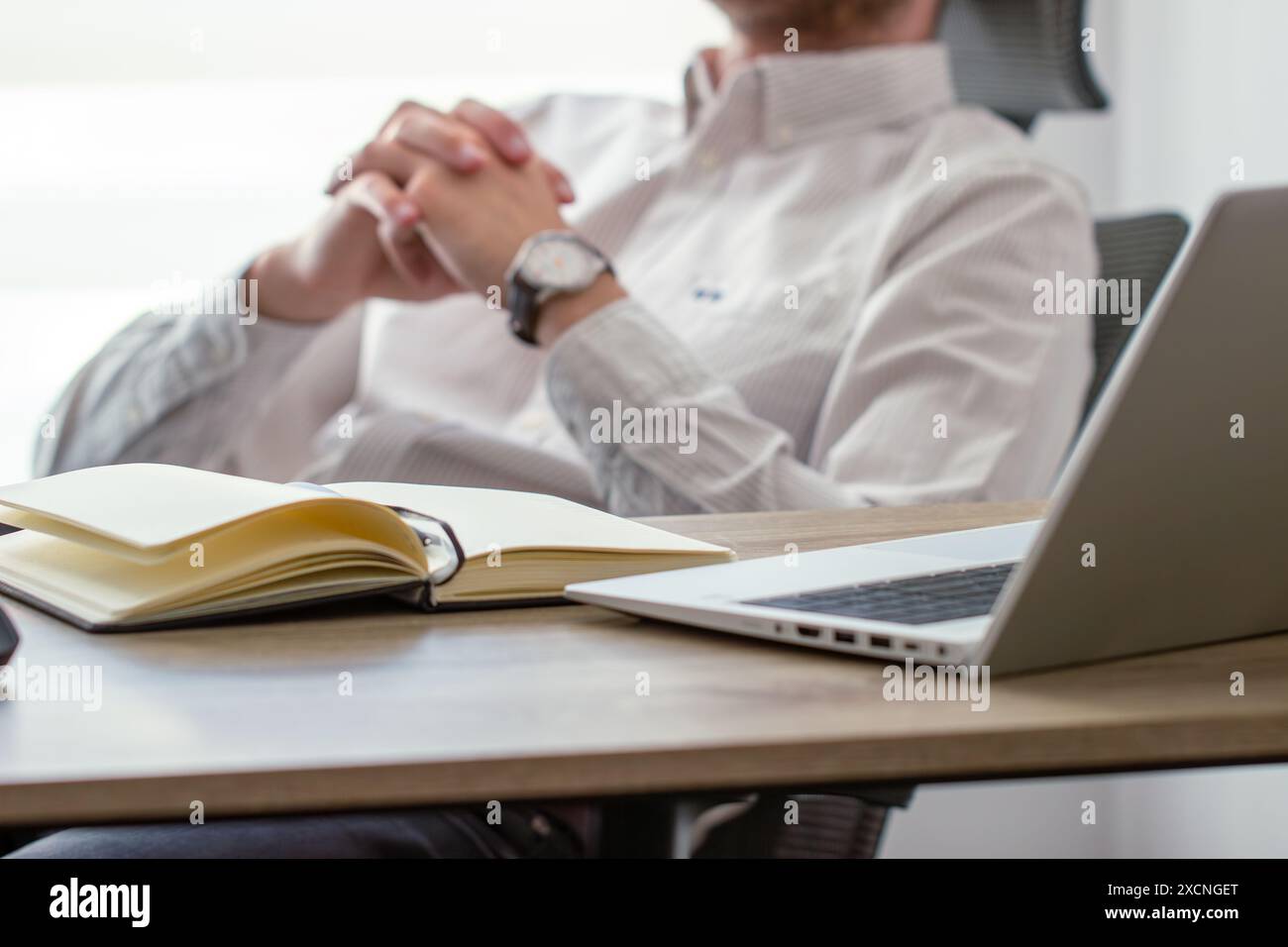 Close up, business man on compute chair. man sitting relaxed on a ...