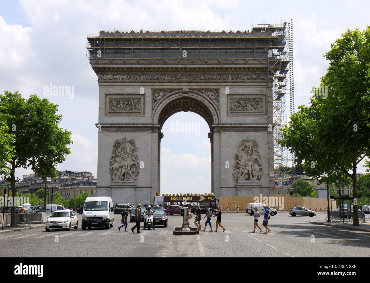 PARIS, FRANCE-JUNE 16,2014:Unidentified People crossing the street in ...