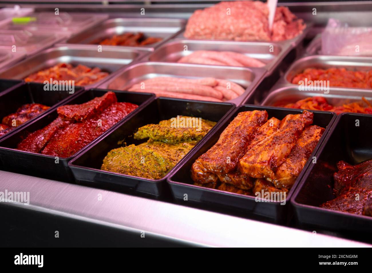 Meat counter in a butchery Stock Photo - Alamy