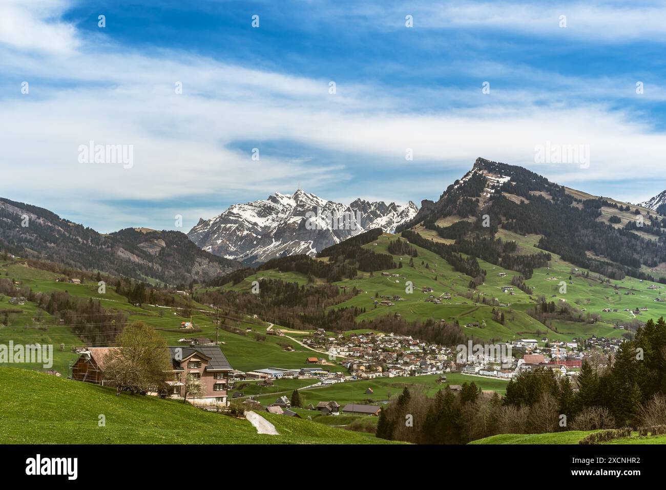 The village of Nesslau-Neu St. Johann with Saentis in the background ...