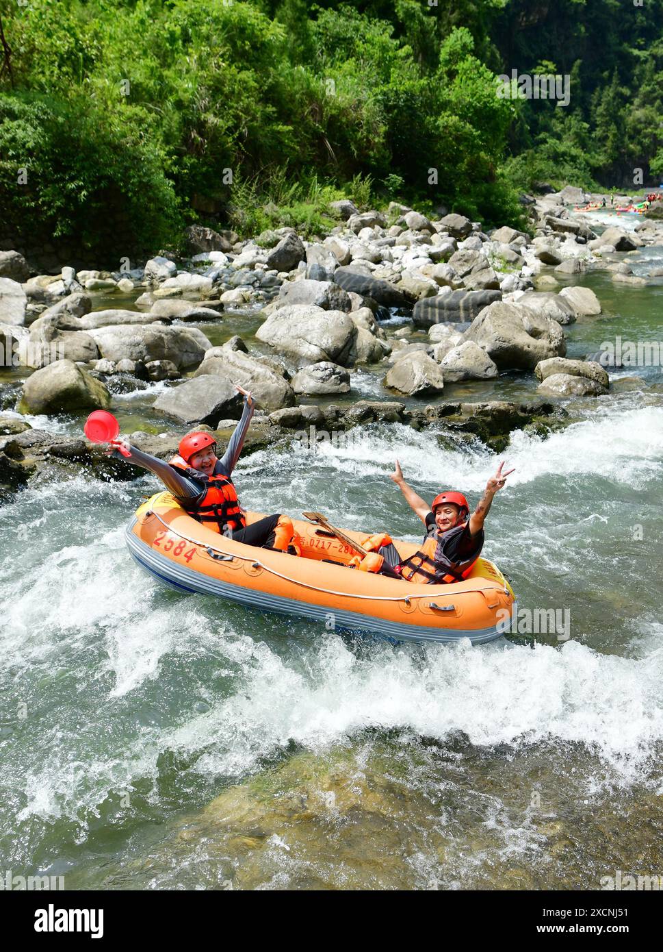 Aerial photo shows tourists enjoying rafting in Yichang City, central ...