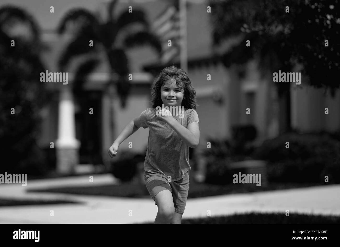 Child running in summer street. Kid enjoy run. Kid running on ...