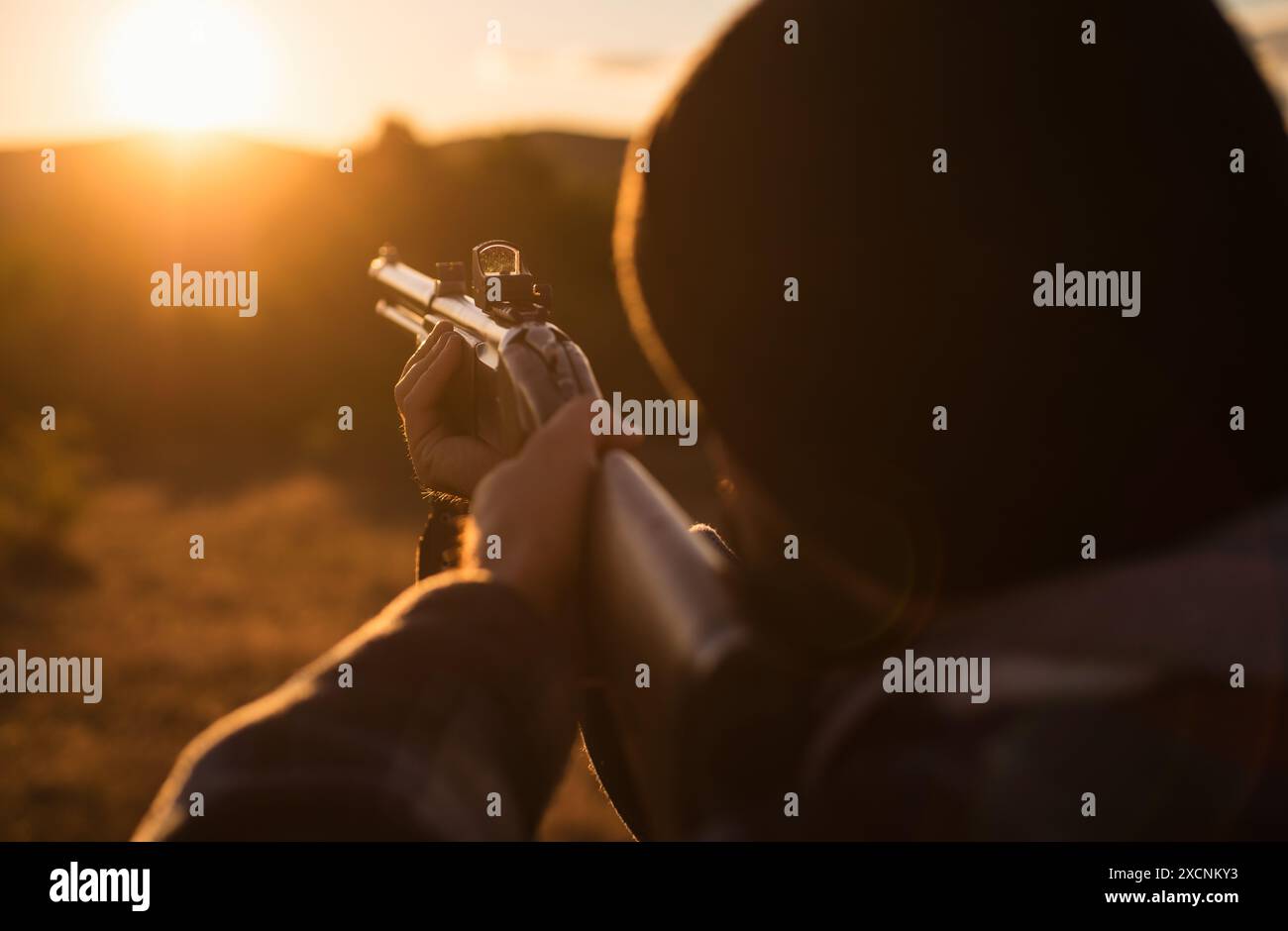Hunter with shotgun gun on hunt. Hunter with Powerful Rifle with Scope ...