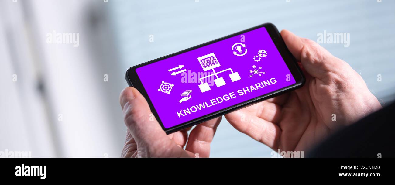 Smartphone screen displaying a knowledge sharing concept Stock Photo ...