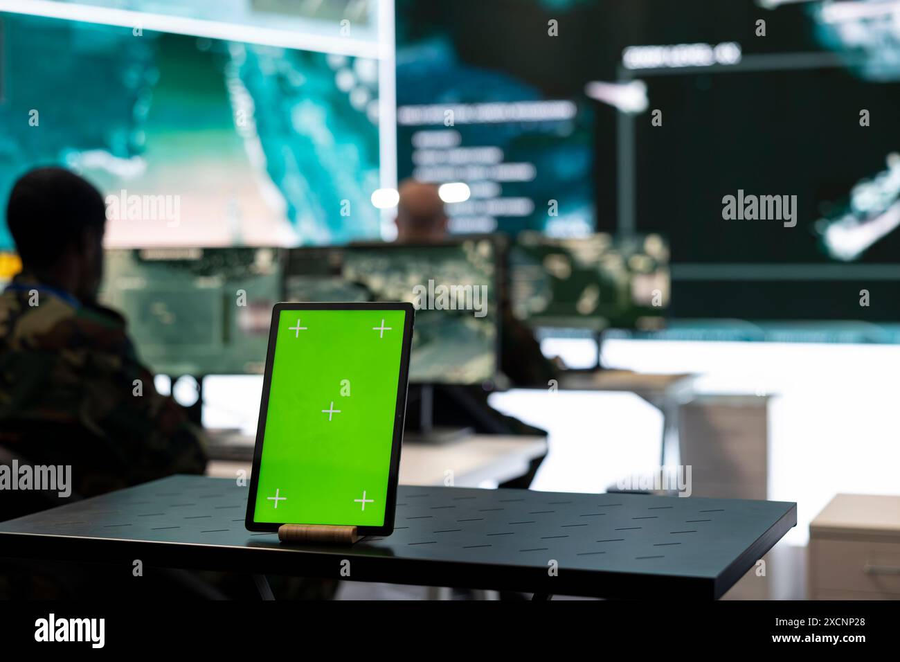 Isolated green screen display running on a tablet in federal army division base, troopers ...