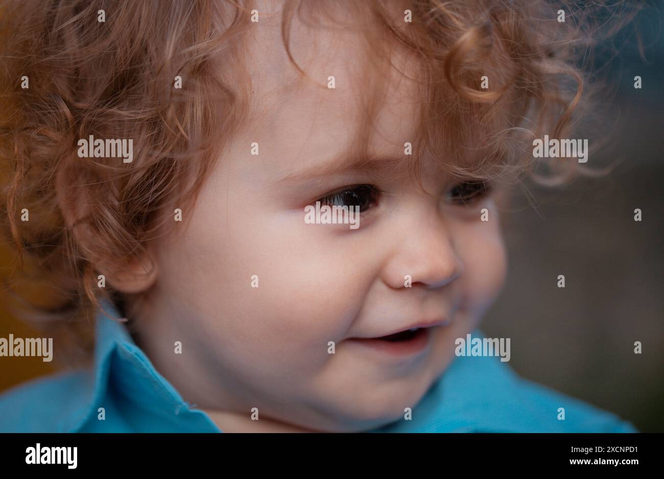 Close up head shot of baby. Kids face, little boy portrait. Smiling ...