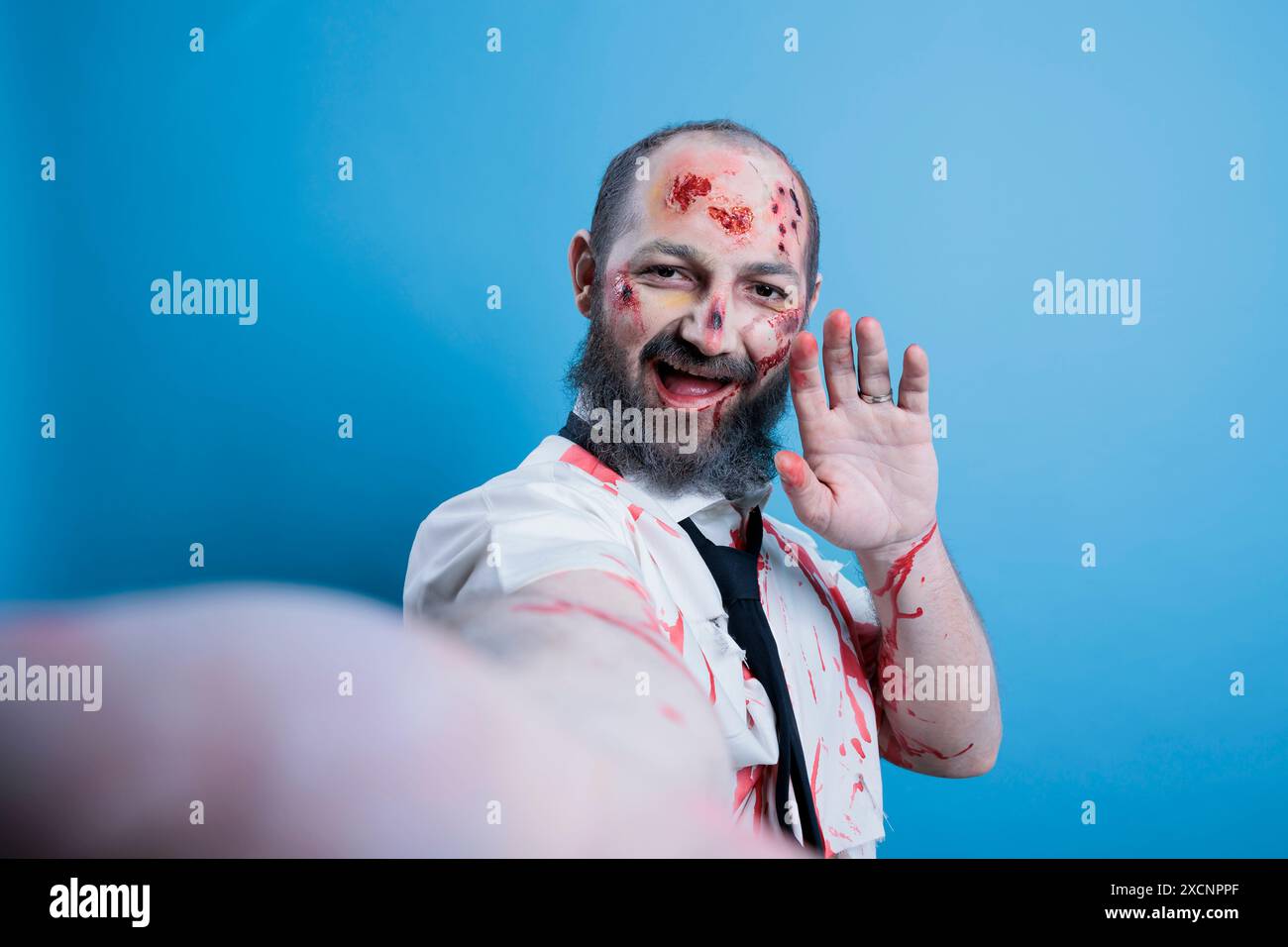 POV of flesh eating zombie with creepy smile taking selfies, waving ...