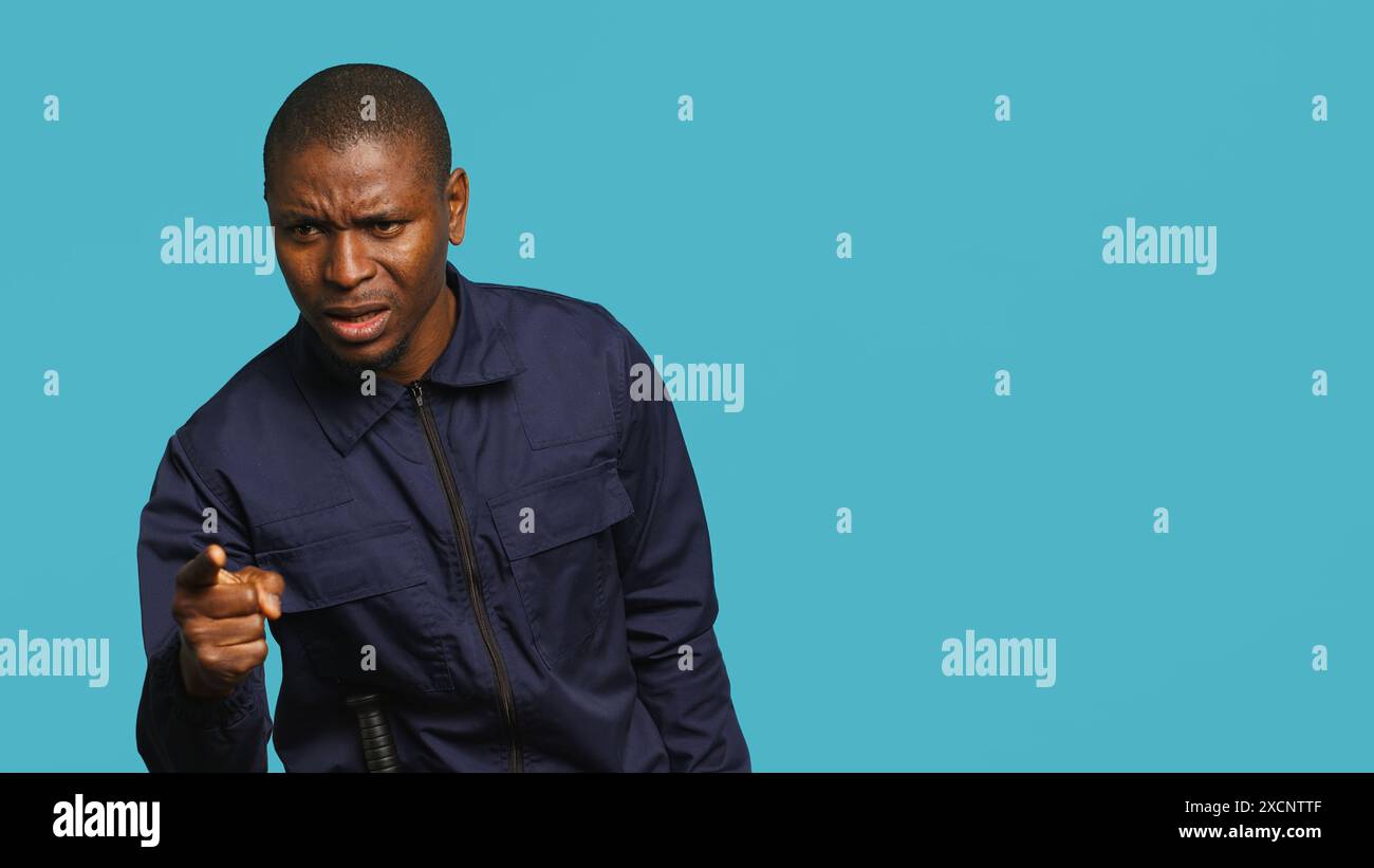 Bored security guard preventing criminal activity, patrolling around ...