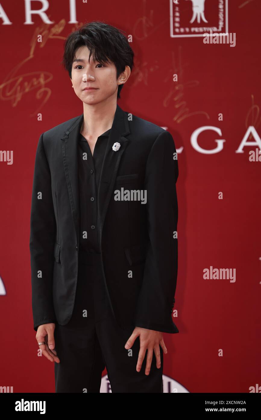 Chinese singer-songwriter, television host and actor Roy Wang poses for ...