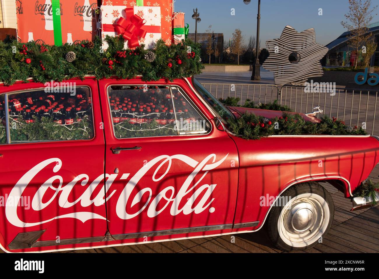 Baku. Azerbaijan. 12.16.2021. New Year's Soviet red Volga filled with ...