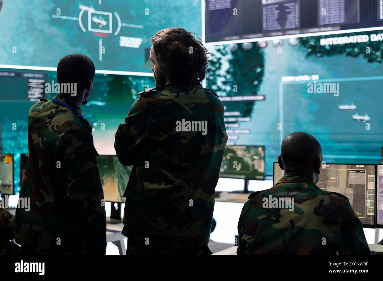 Military personnel discussing about enemy vessel trajectory in control ...