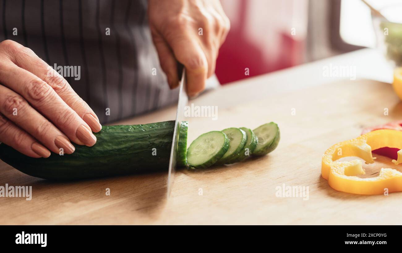 Woman hands slicing pepper in hi-res stock photography and images - Alamy