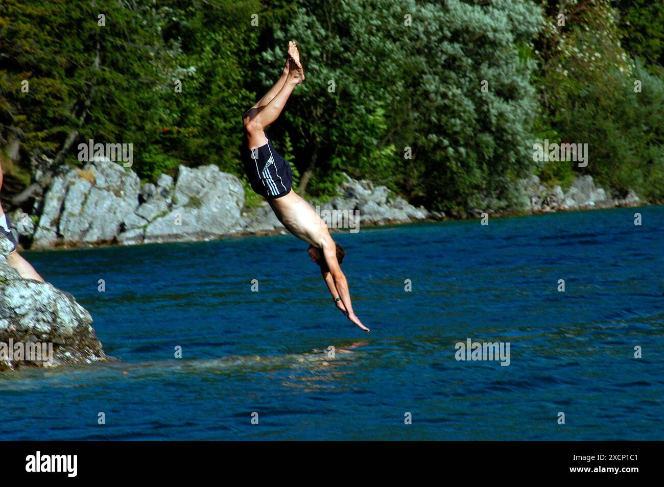 outdoor bathing in the cool water of a mountain lake bathing in the ...