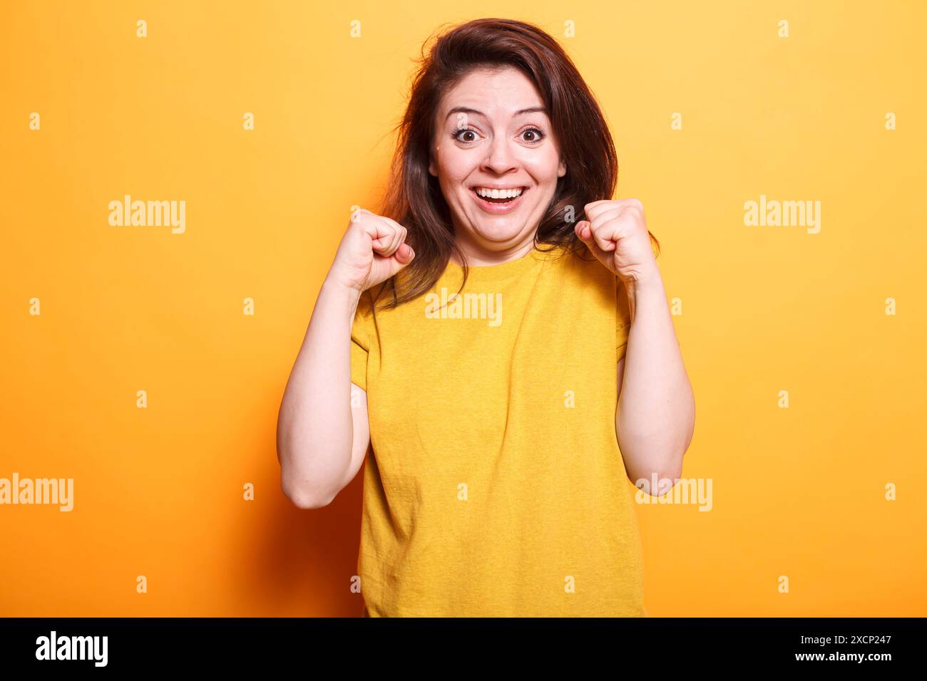 Woman making playful gestures hi-res stock photography and images - Alamy