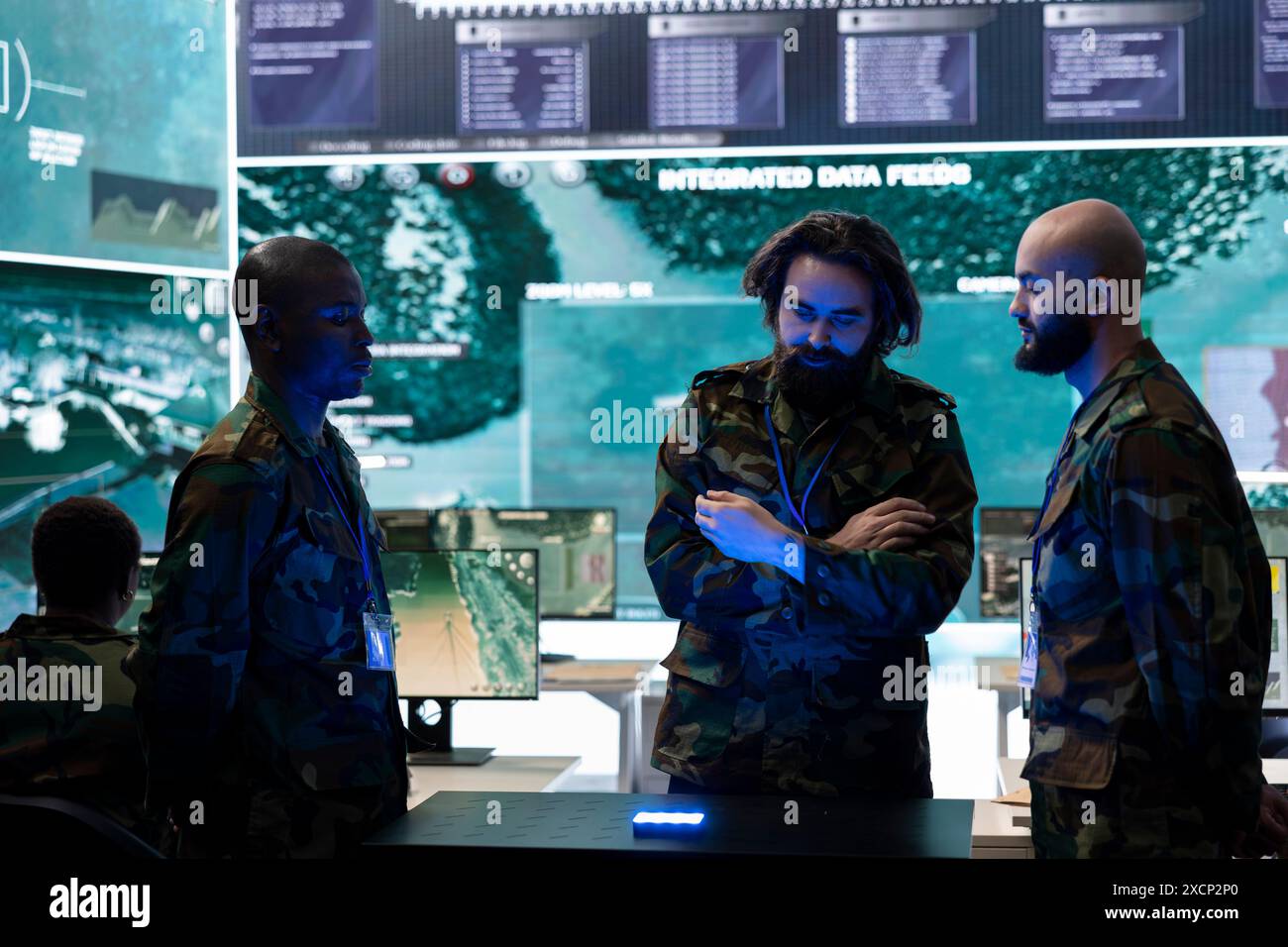 Diverse soldiers analyzing satellite images on a 3d hologram to discuss ...