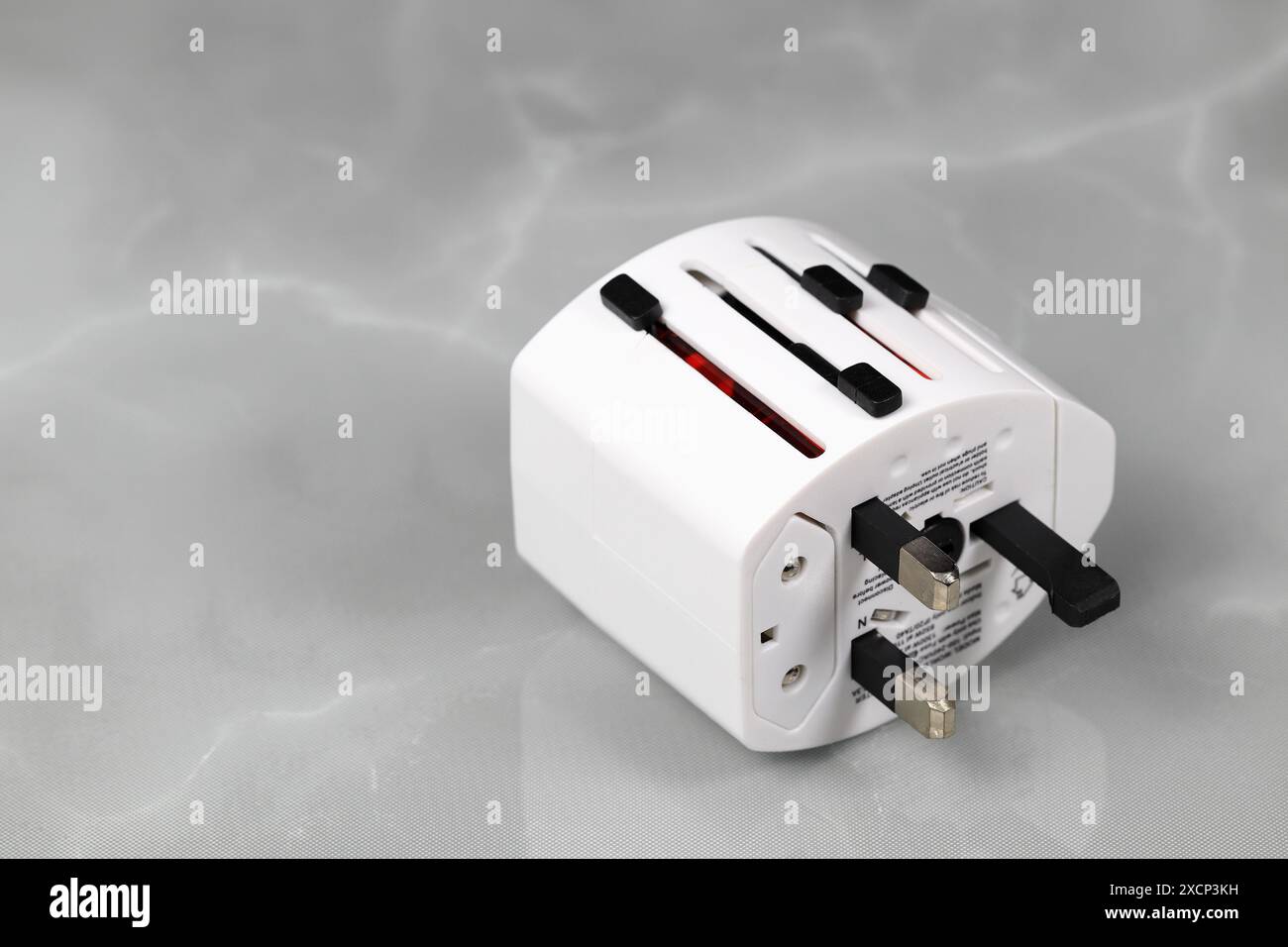 Universal plug adapter, travel plug adapter isolated on reflection ...