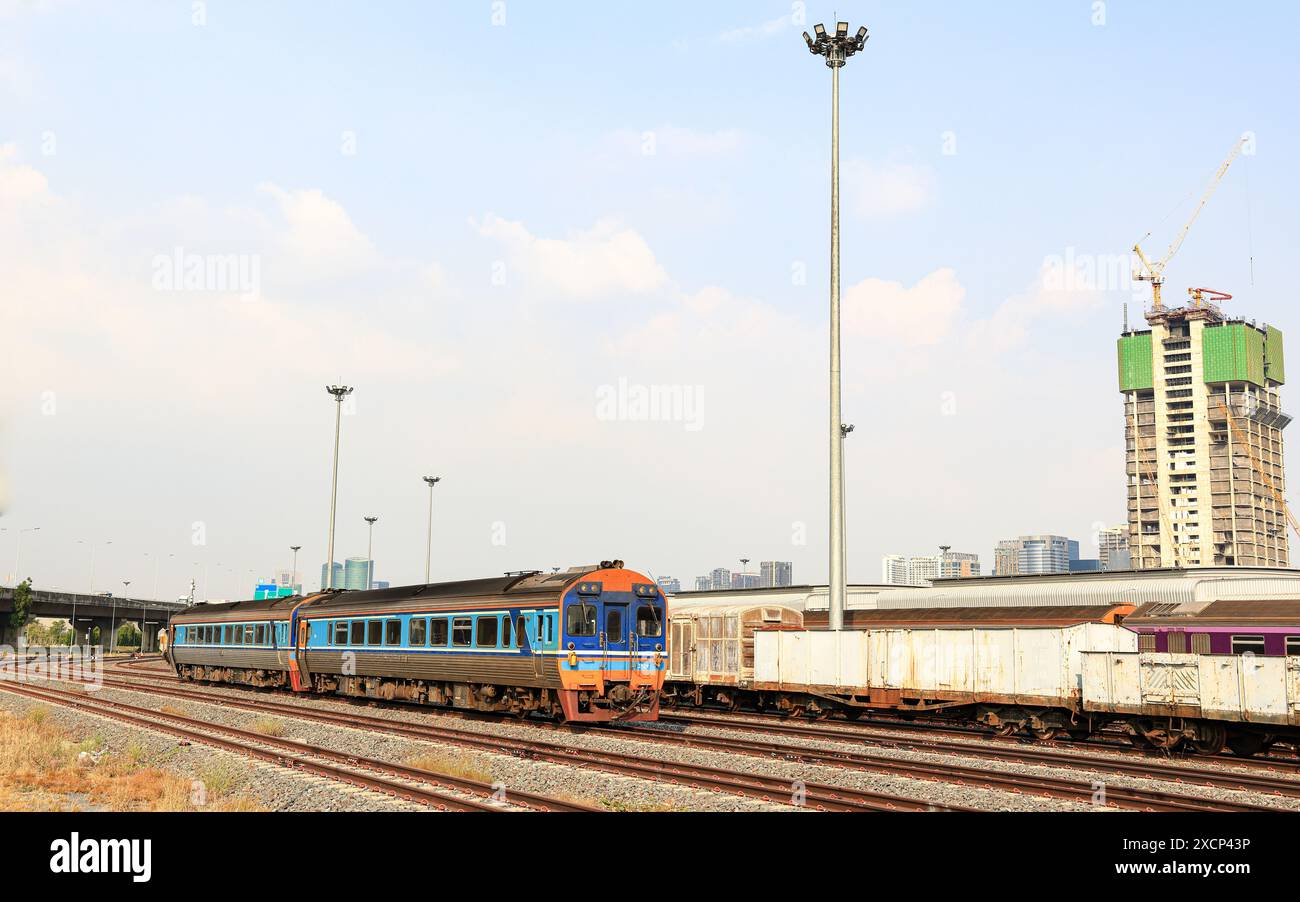diesel multiple unit or Diesel Railcar on the railroad tracks near ...