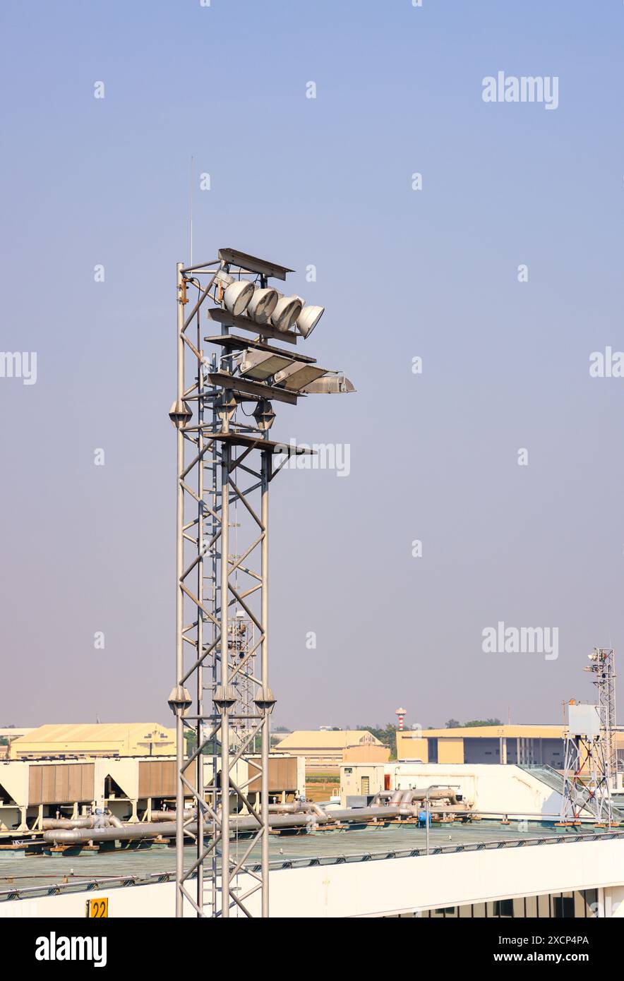 exterior lamp posts, spotlight pole in airport Stock Photo - Alamy