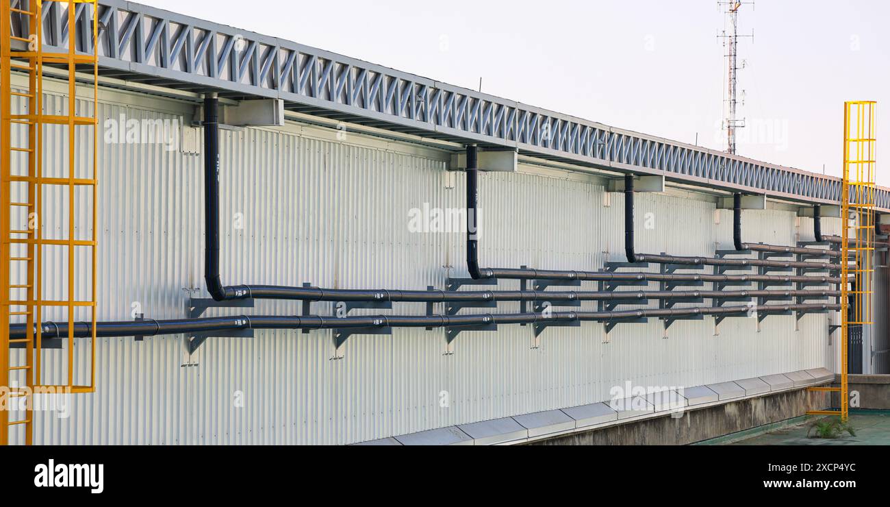 Orderly drainage pipes, pipe with label "RL" with direction for rain ...