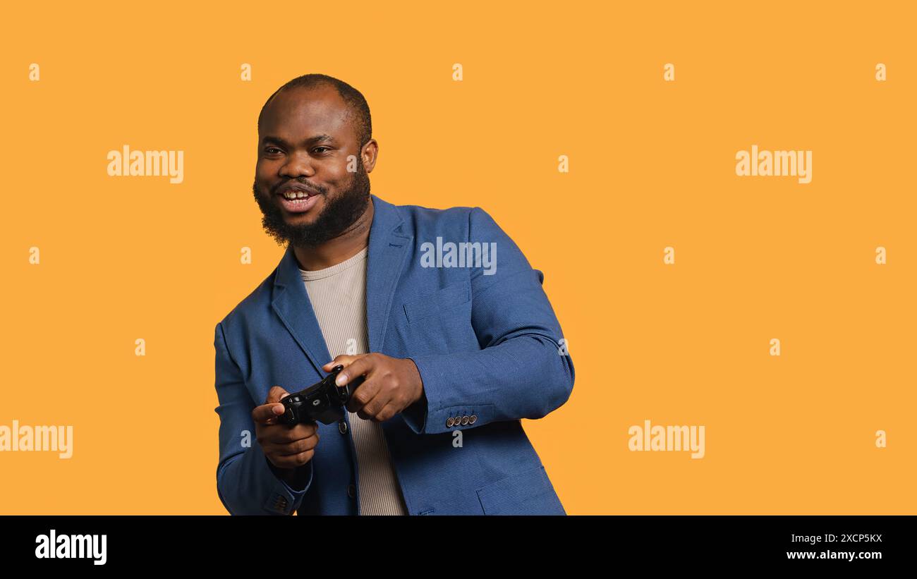 Cheerful african american gamer showing thumbs up sign gesturing ...