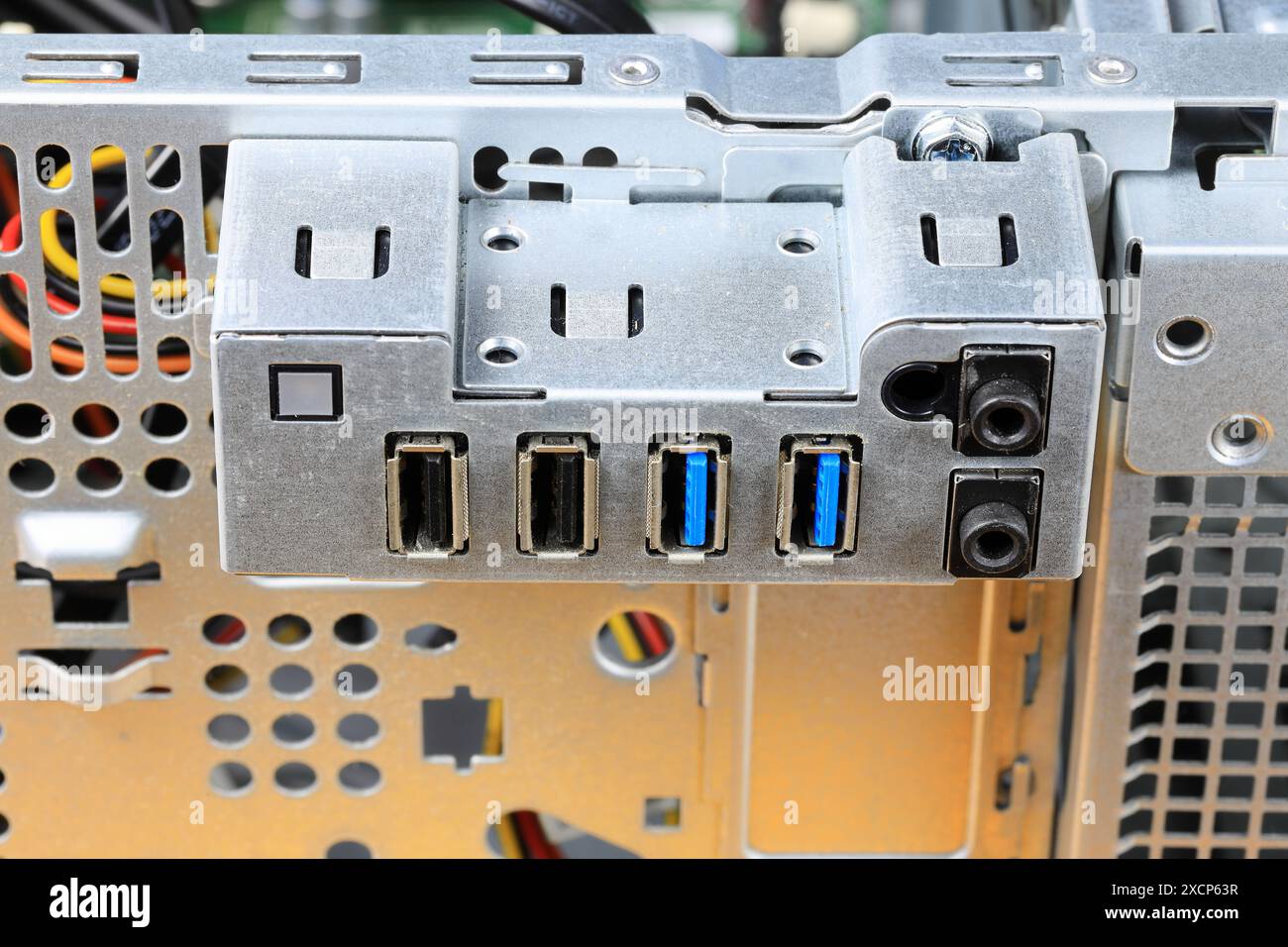 Multiple ports on front of computer case show with USB and audio ports ...