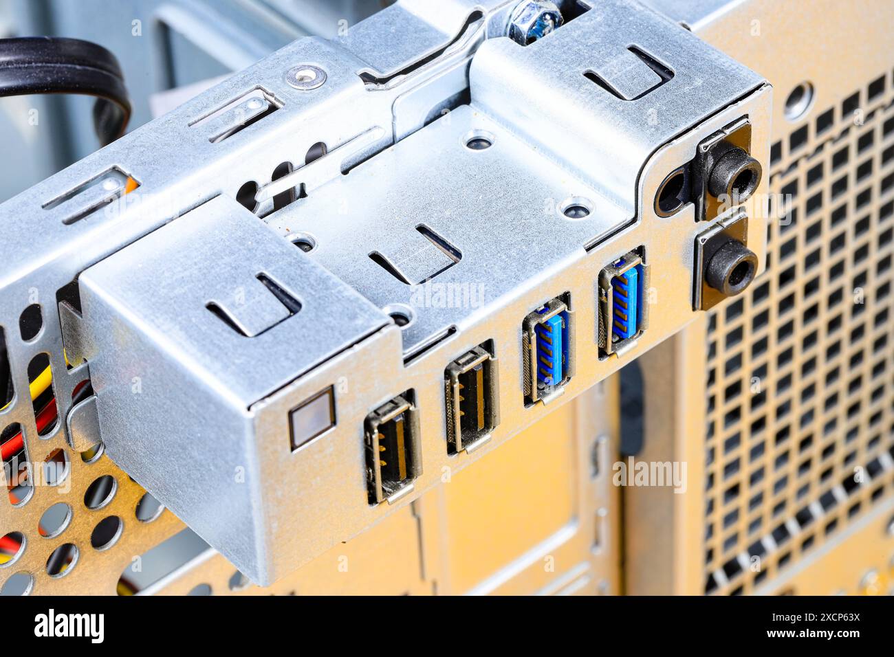 Multiple ports on front of computer case show with USB and audio ports ...