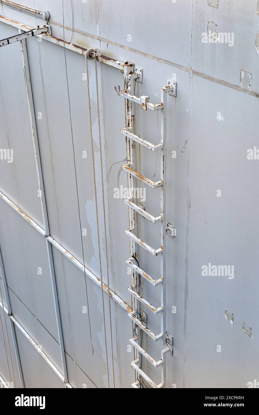 vertical old metal Staircase industrial with no safety rails on wall of ... vertical old metal Staircase industrial with no safety rails on wall of ...