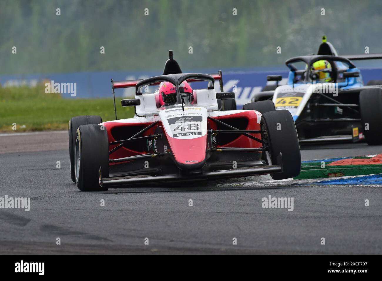Lifting a front wheel at the chicane, Alex Berg, Fortec Motorsport ...