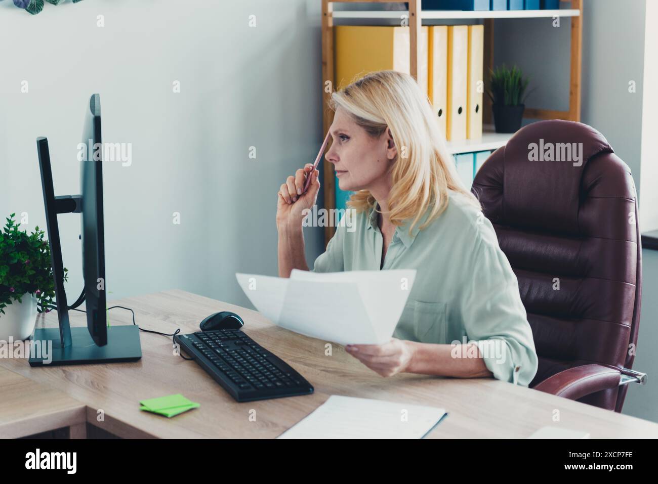 Photo of nice minded woman reading project looking screen computer in ...