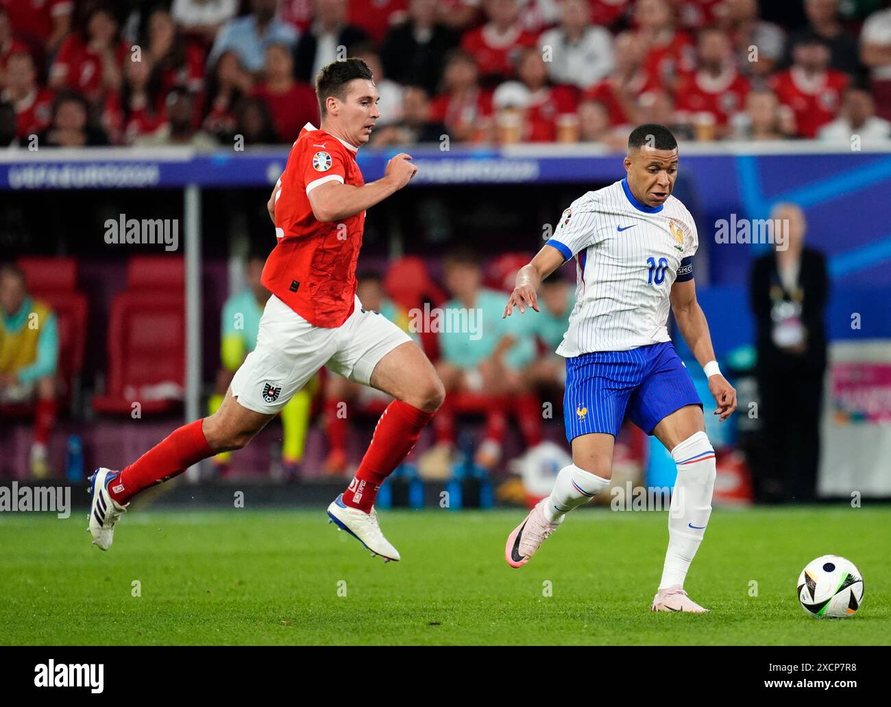 Austria's Max Wober (left) and France's Kylian Mbappe in action during ...