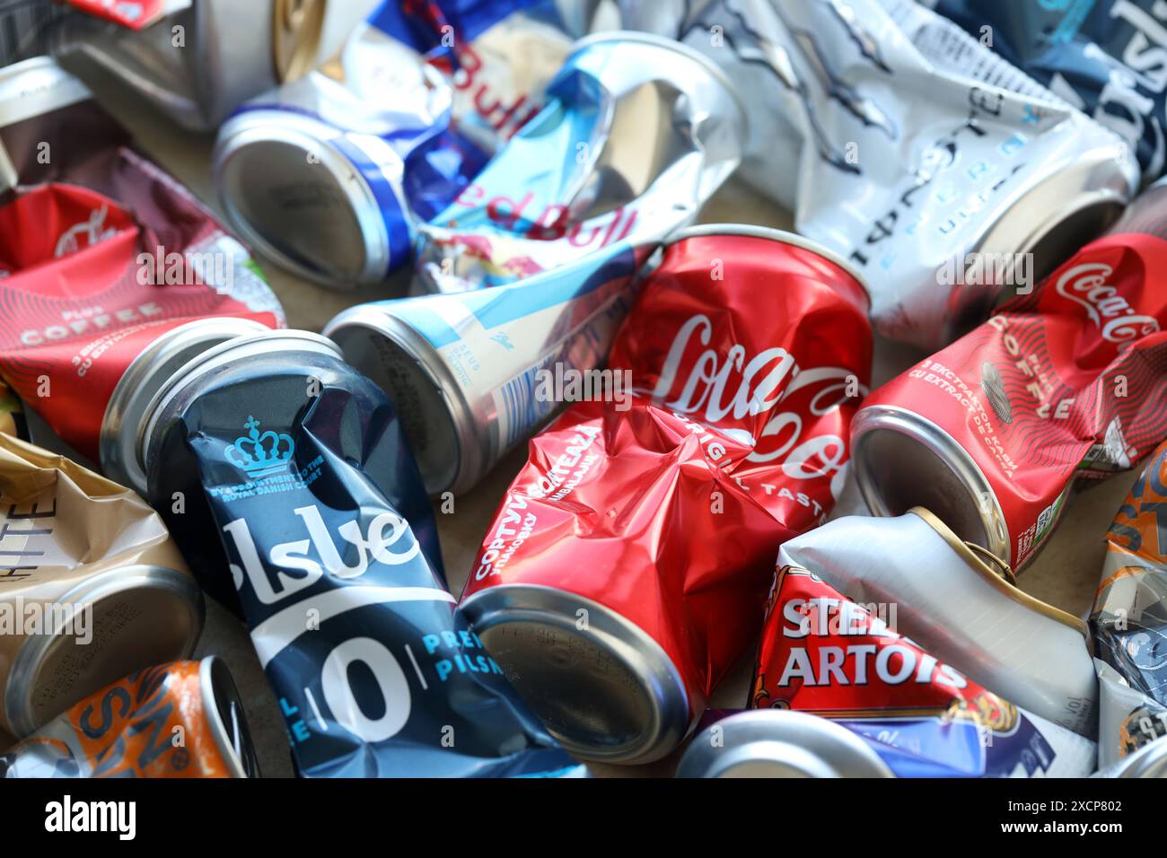 KYIV, UKRAINE - APRIL 20, 2024 Background of various crashed beer cans ...