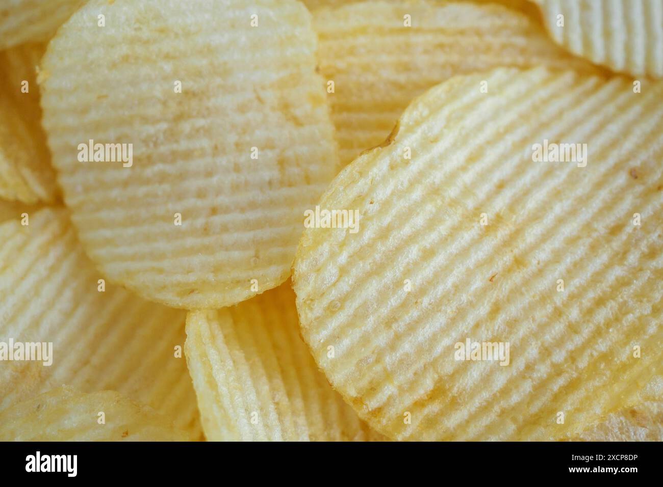 crispy potato chips snack texture background Stock Photo - Alamy