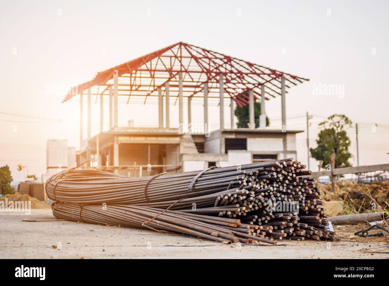 steel rebar for reinforcement concrete at construction site with house ...