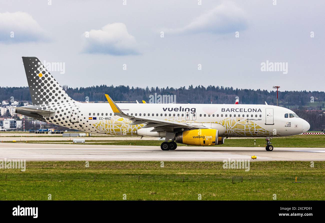 An Airbus A320-232 operated by Vueling Airlines taxies to the runway at ...
