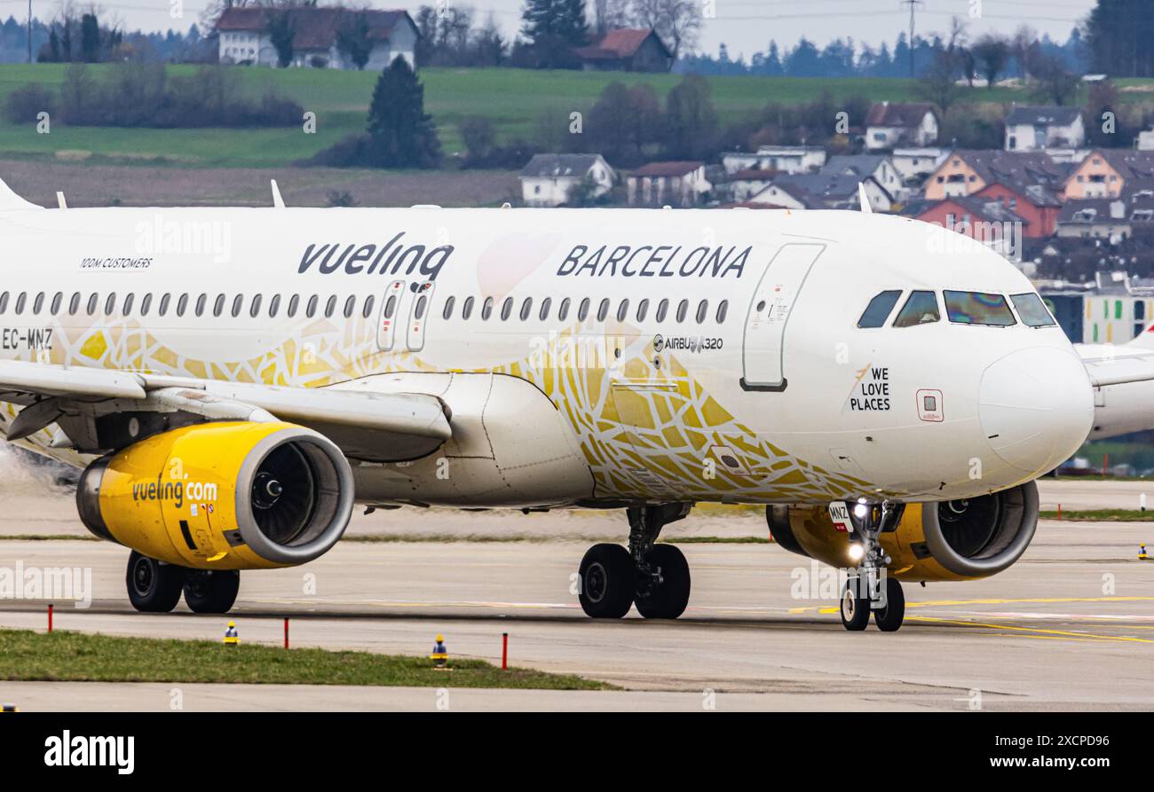 An Airbus A320-232 operated by Vueling Airlines taxies to the runway at ...
