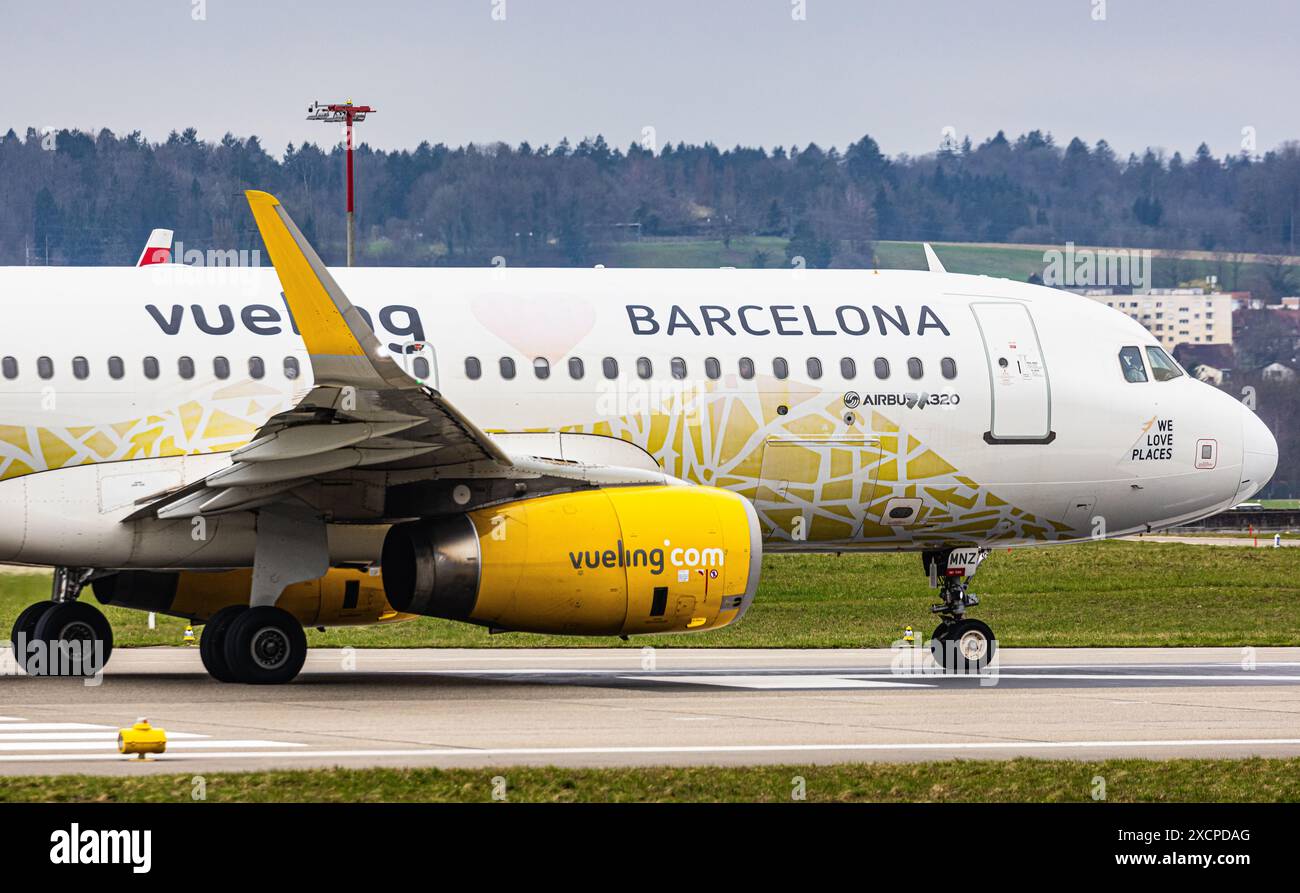 An Airbus A320-232 operated by Vueling Airlines taxies to the runway at ...