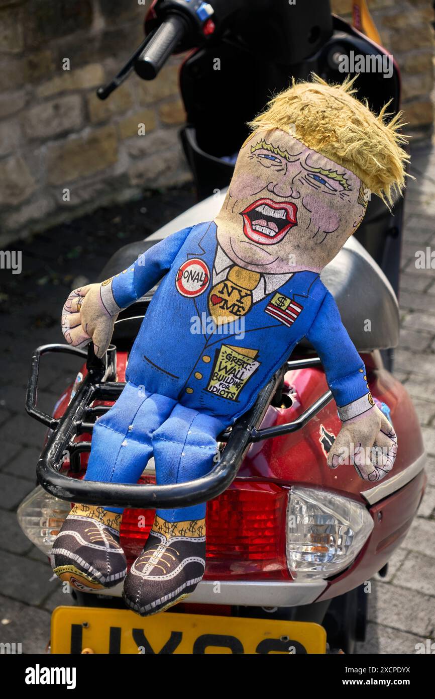 Donald Trump doll affixed to a motorcycle. England UK Stock Photo - Alamy